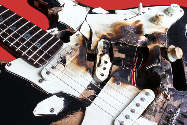 This Strat Looks Smashed to Shit, But Plays Like a Normal Guitar ...
