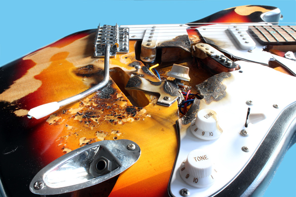 This Strat Looks Smashed to Shit, But Plays Like a Normal Guitar ...